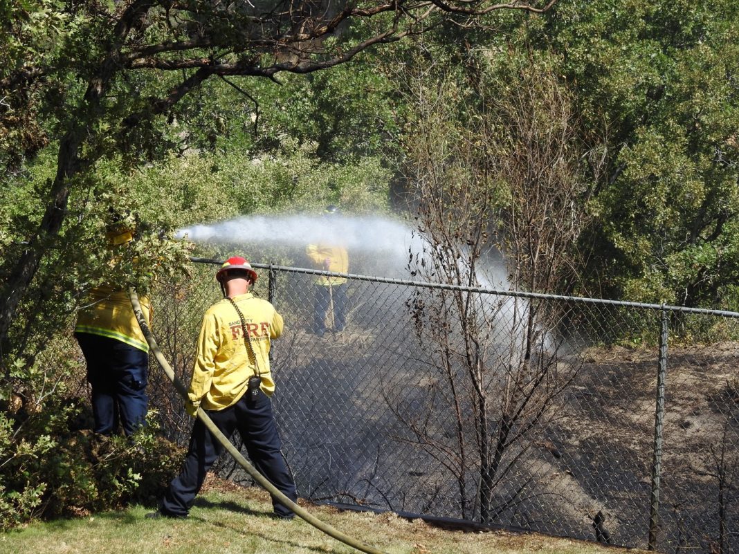 Crews fight field fire threatening homes in Sandy | Gephardt Daily