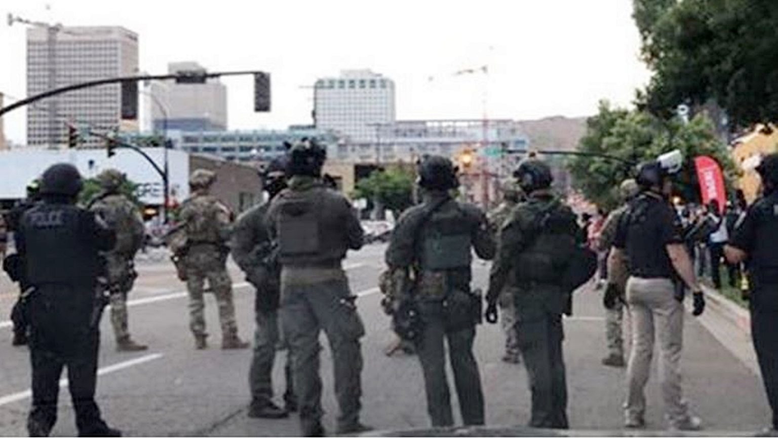 Riot police respond after peaceful protest turns violent, destructive ...