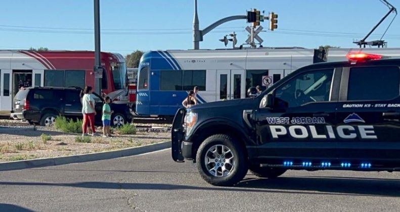 UTA: Driver injured after driving around lowered West Jordan TRAX ...