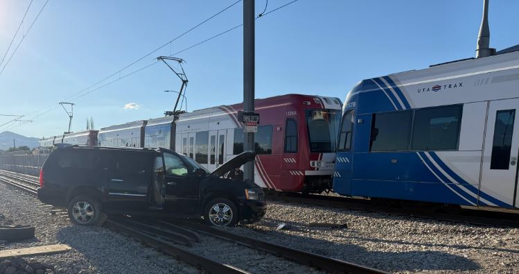 UTA: Driver injured after driving around lowered West Jordan TRAX ...