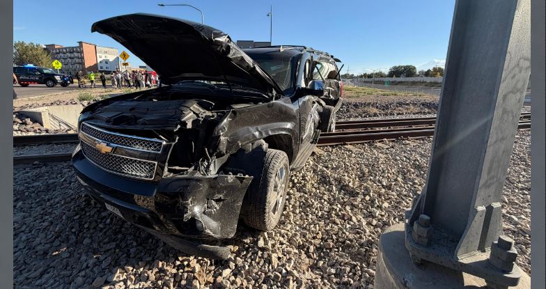 UTA: Driver injured after driving around lowered West Jordan TRAX ...