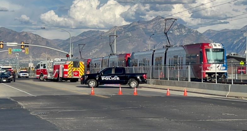 UTA: Driver injured after driving around lowered West Jordan TRAX ...